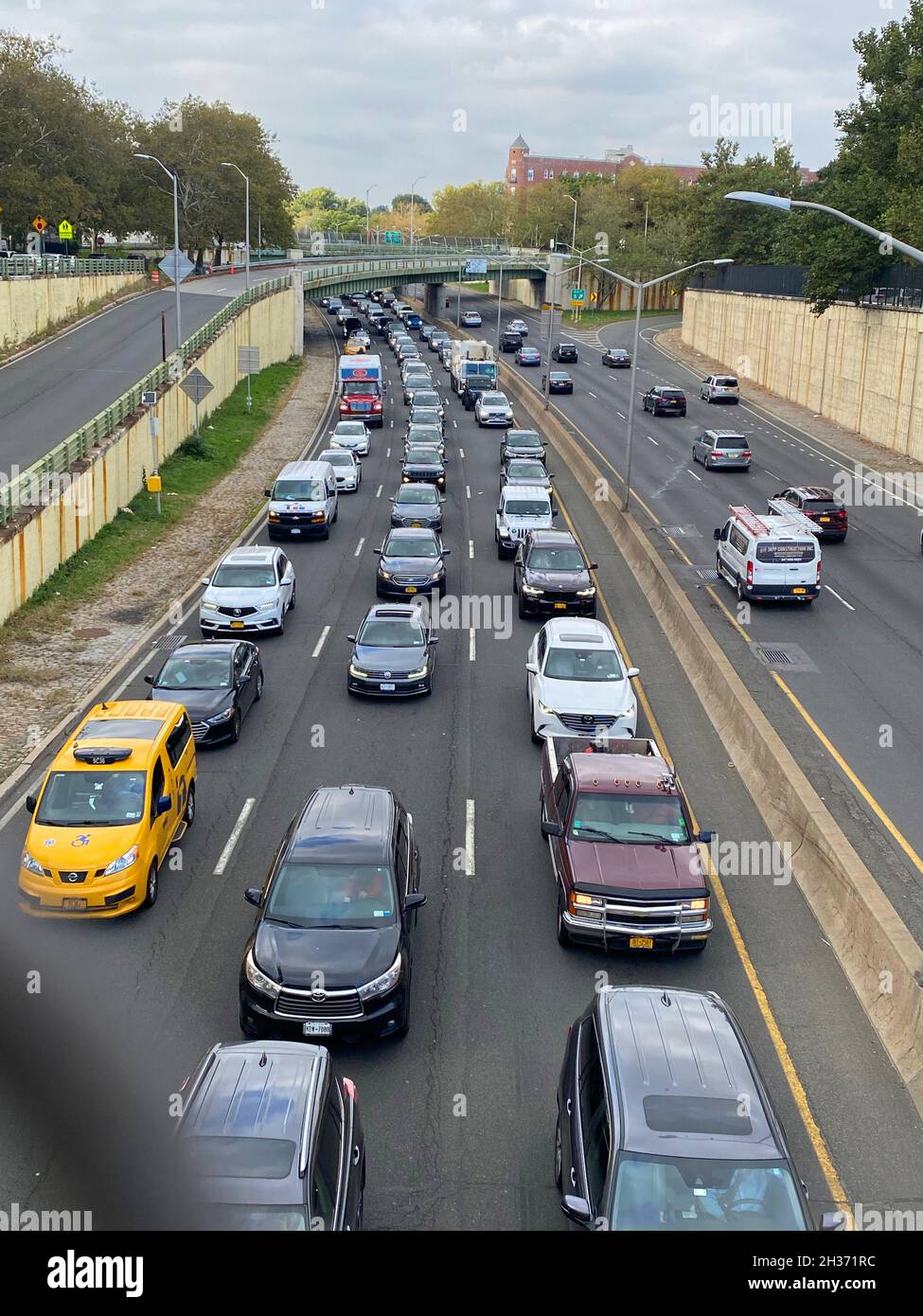 Late afternoon rush hour traffic building up on the Prospect Expressway ...