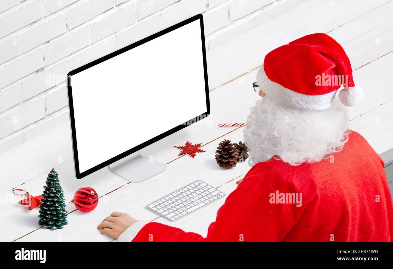 Santa Claus work on computer concept. Isolated display for mockup ...
