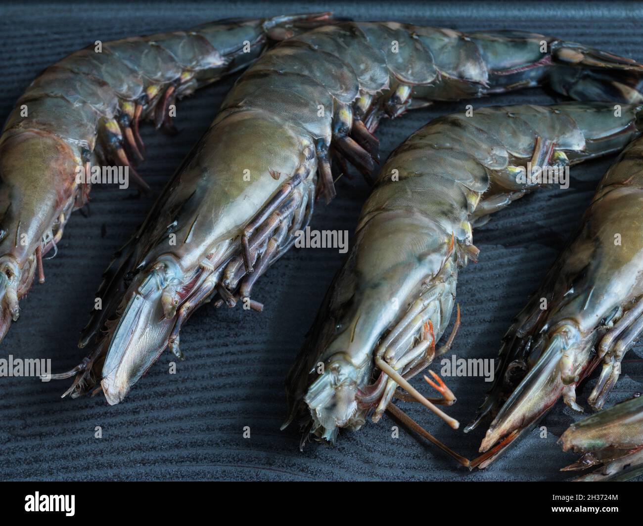 Raw black tiger prawns hi-res stock photography and images - Alamy
