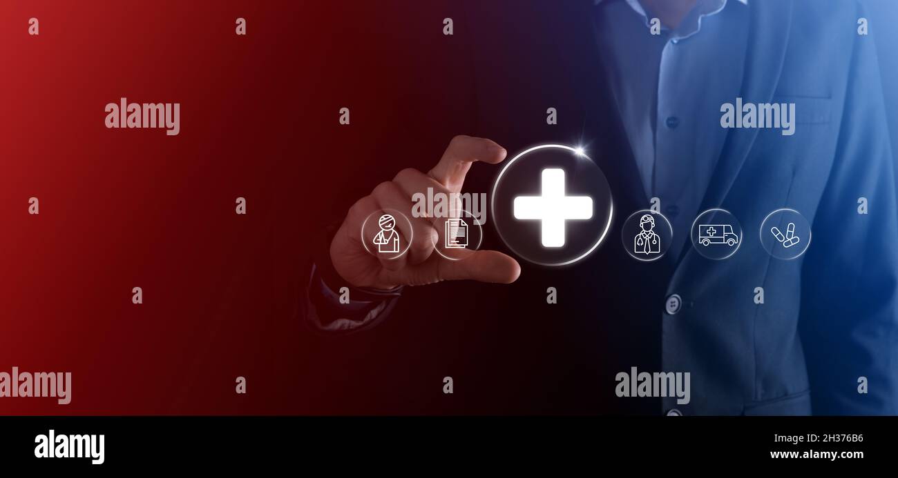 Businessman hold virtual plus medical network connection icons. Covid ...