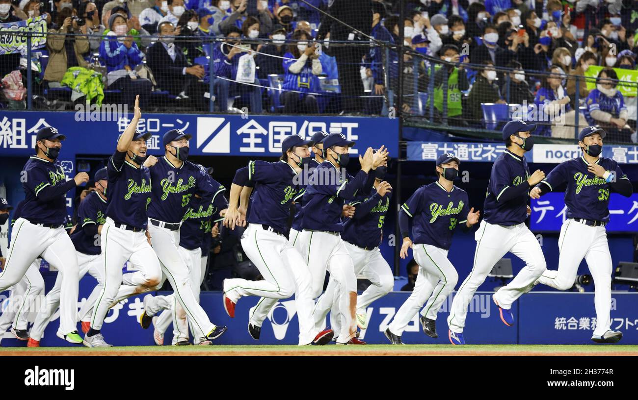 The Yakult Swallows celebrate at Yokohama Stadium after clinching the ...