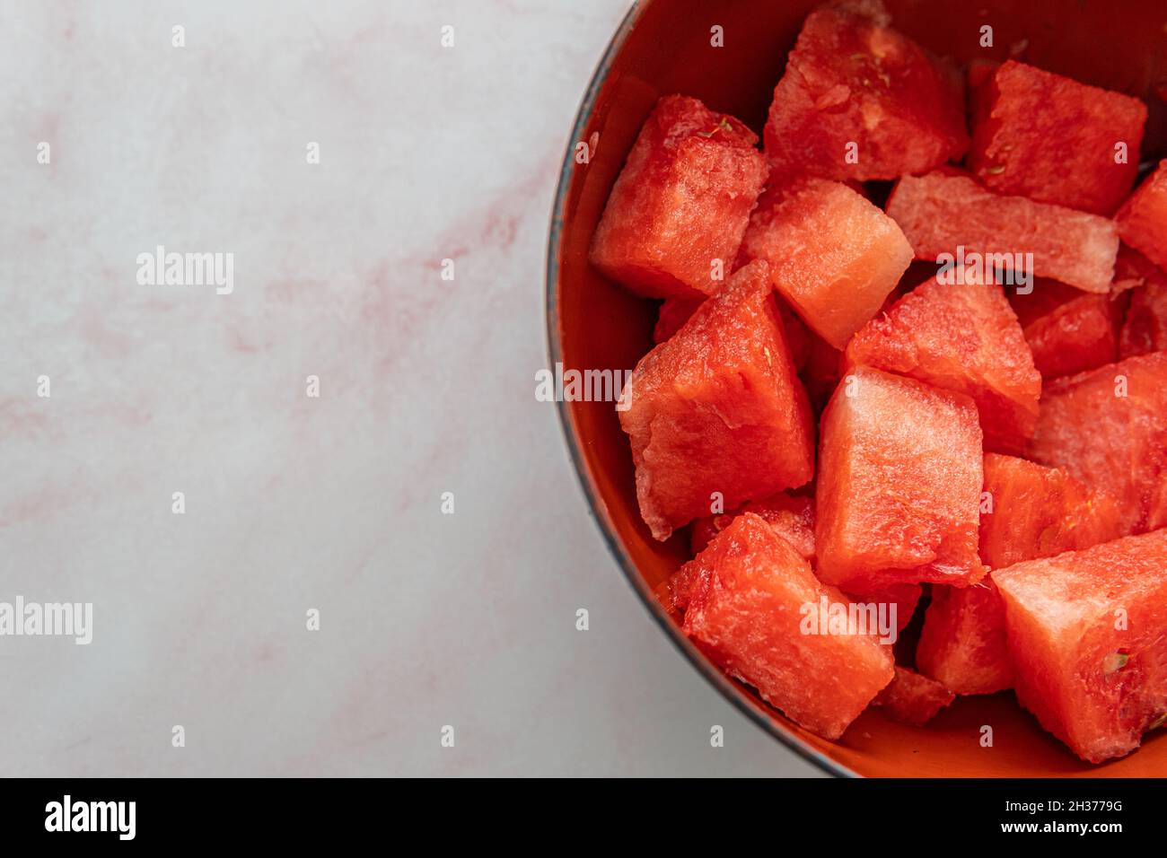 Half Watermelon and chunks of watermelon ready to eat Stock Photo - Alamy