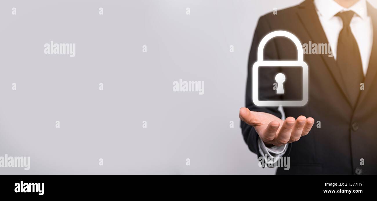 Male hand holding a lock padlock icon.Cyber security network. Internet ...