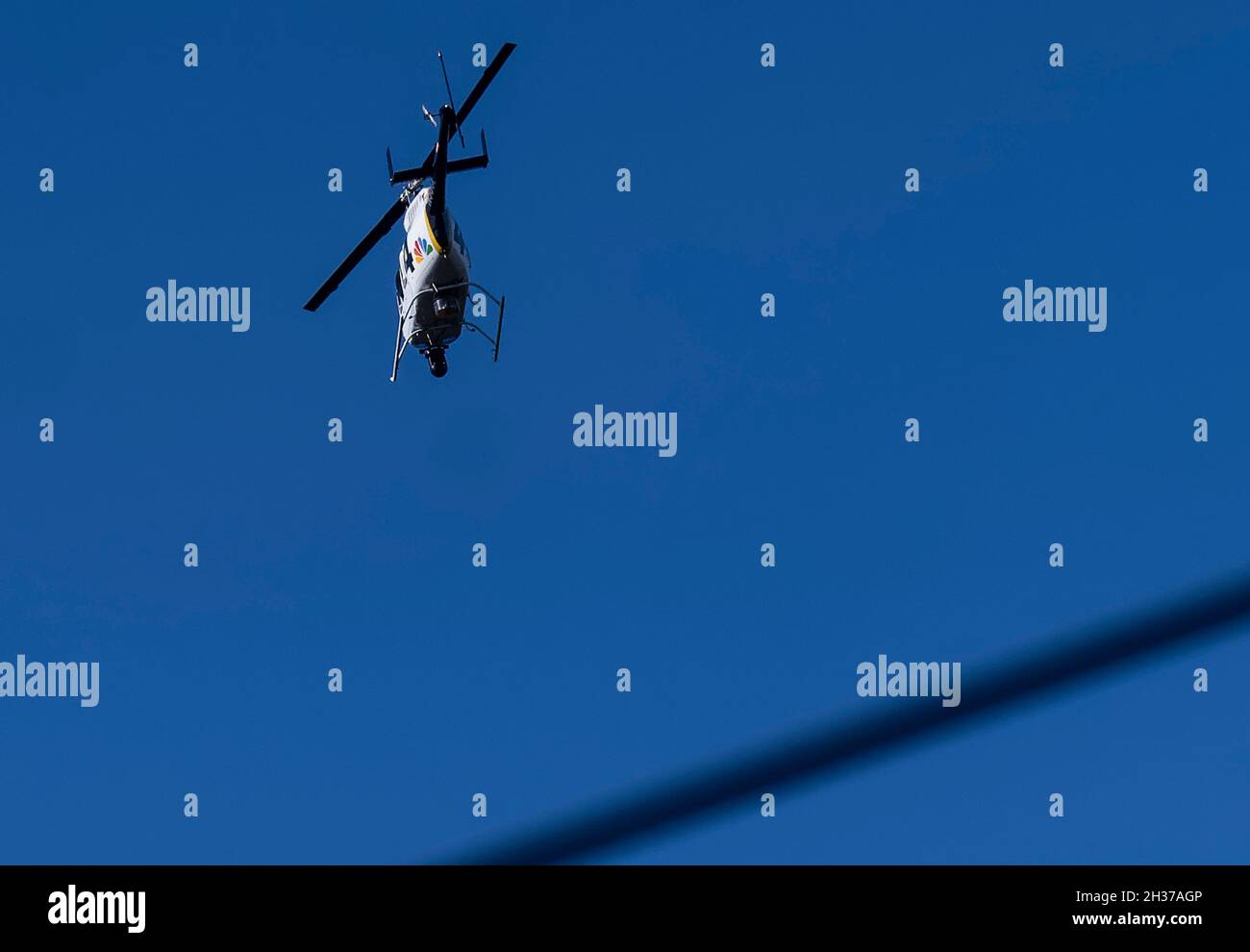 Television news gathering helicopter overhead Stock Photo - Alamy