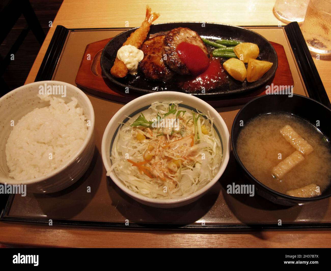 Traditional japanese food set rice hamburger steak and tempura with ...