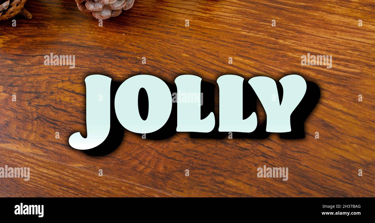 Composition of jolly text over table at christmas Stock Photo - Alamy