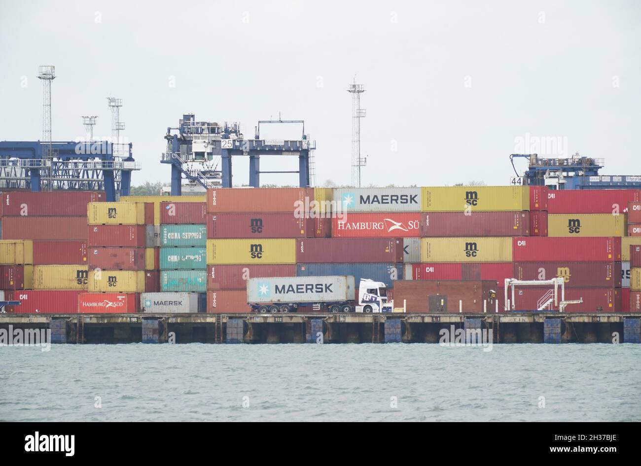 Shipping containers ship at the Port of Felixstowe, in Felixstowe ...