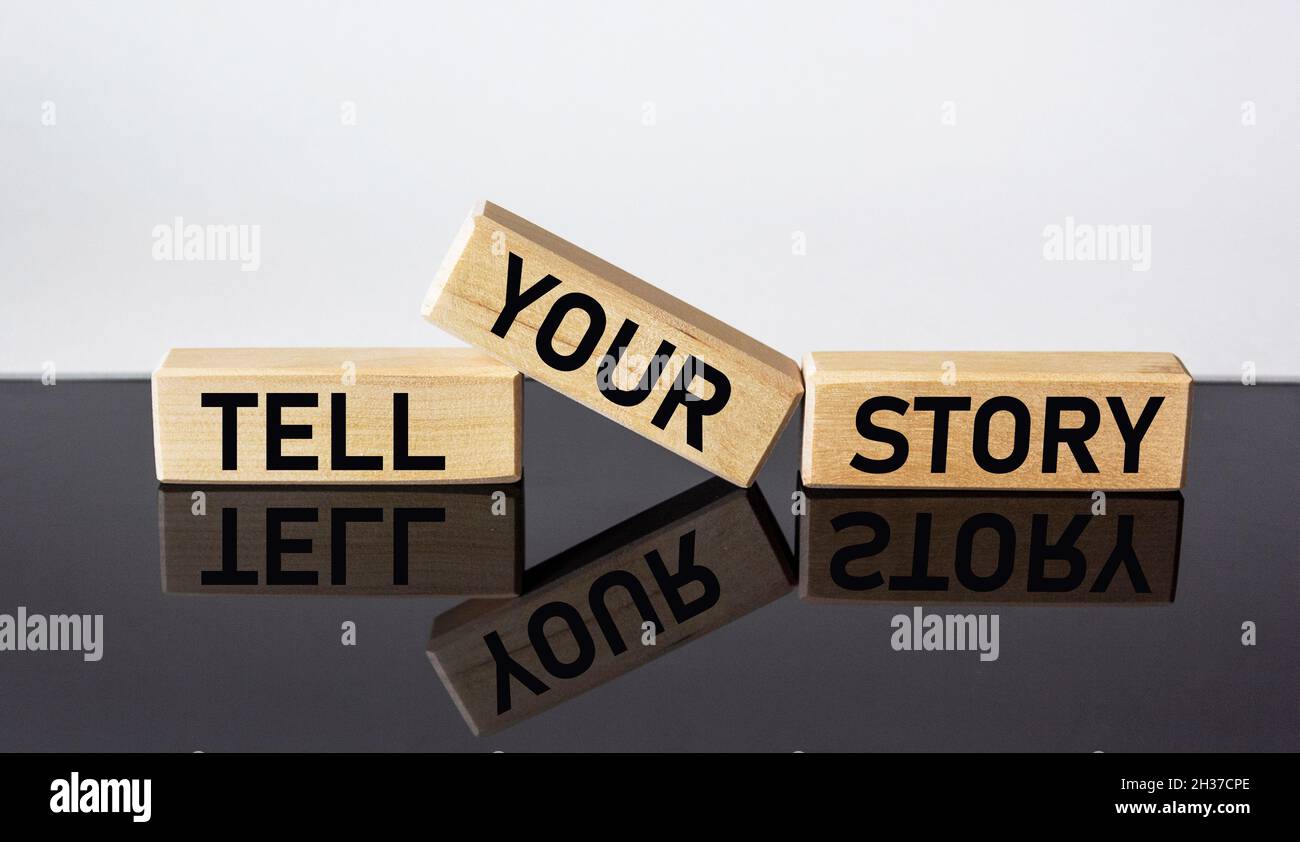 Tell your story with word on wood blocks and white and black background ...