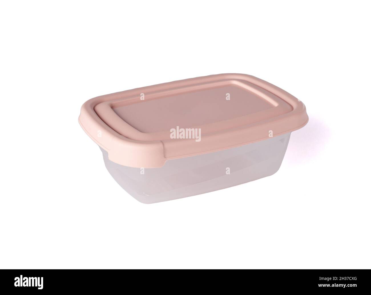 Plastic food storage container with pink lid isolated on white ...