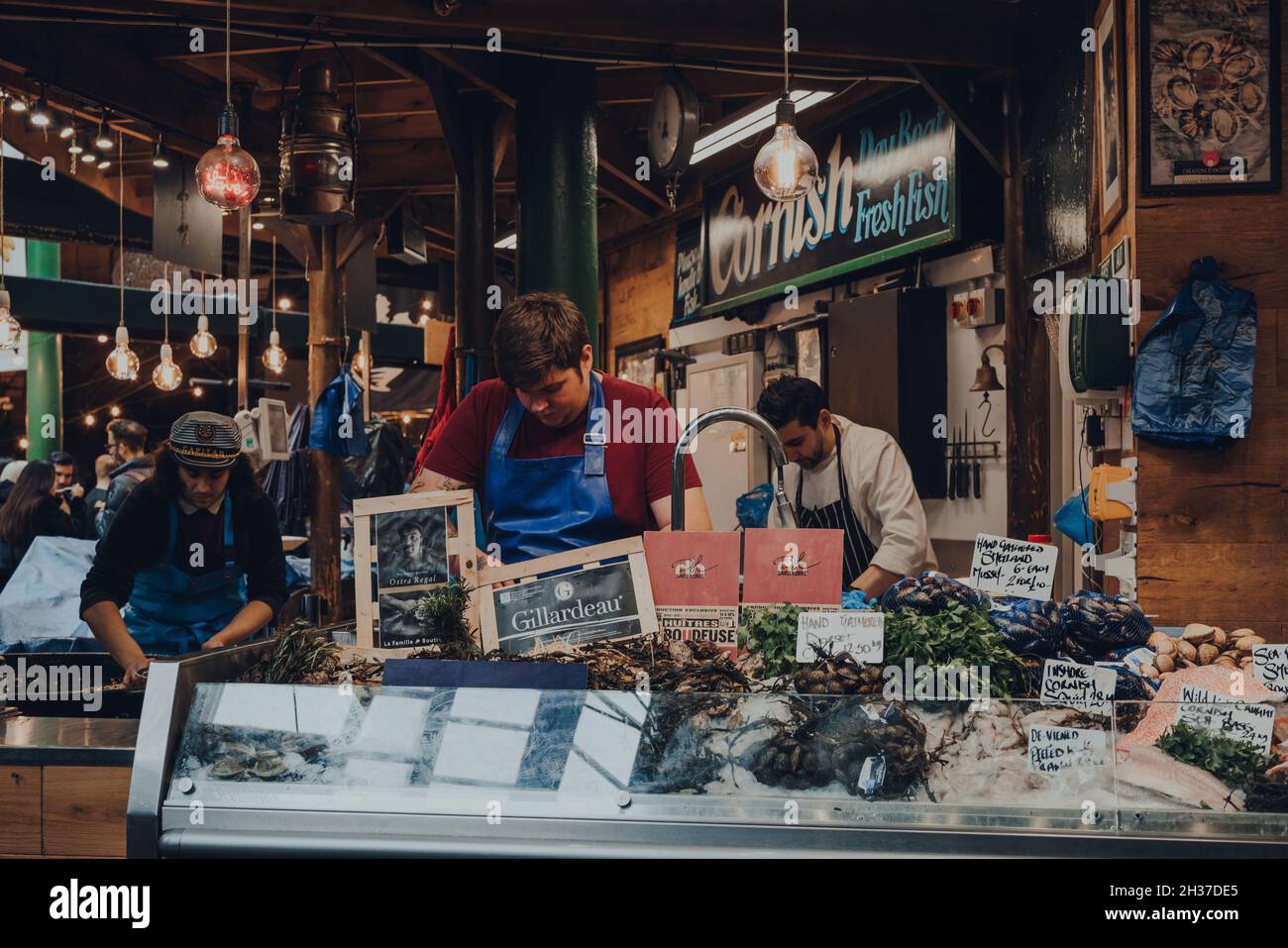 London, UK - October 17, 2021: Staff working at a Shellseekers ...