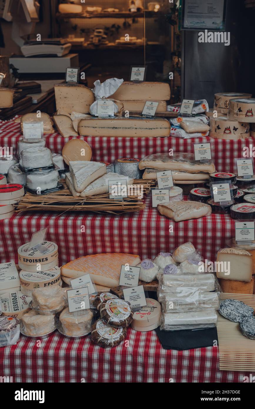 London, UK - October 17, 2021: Variety of cheeses at a cheese and ...