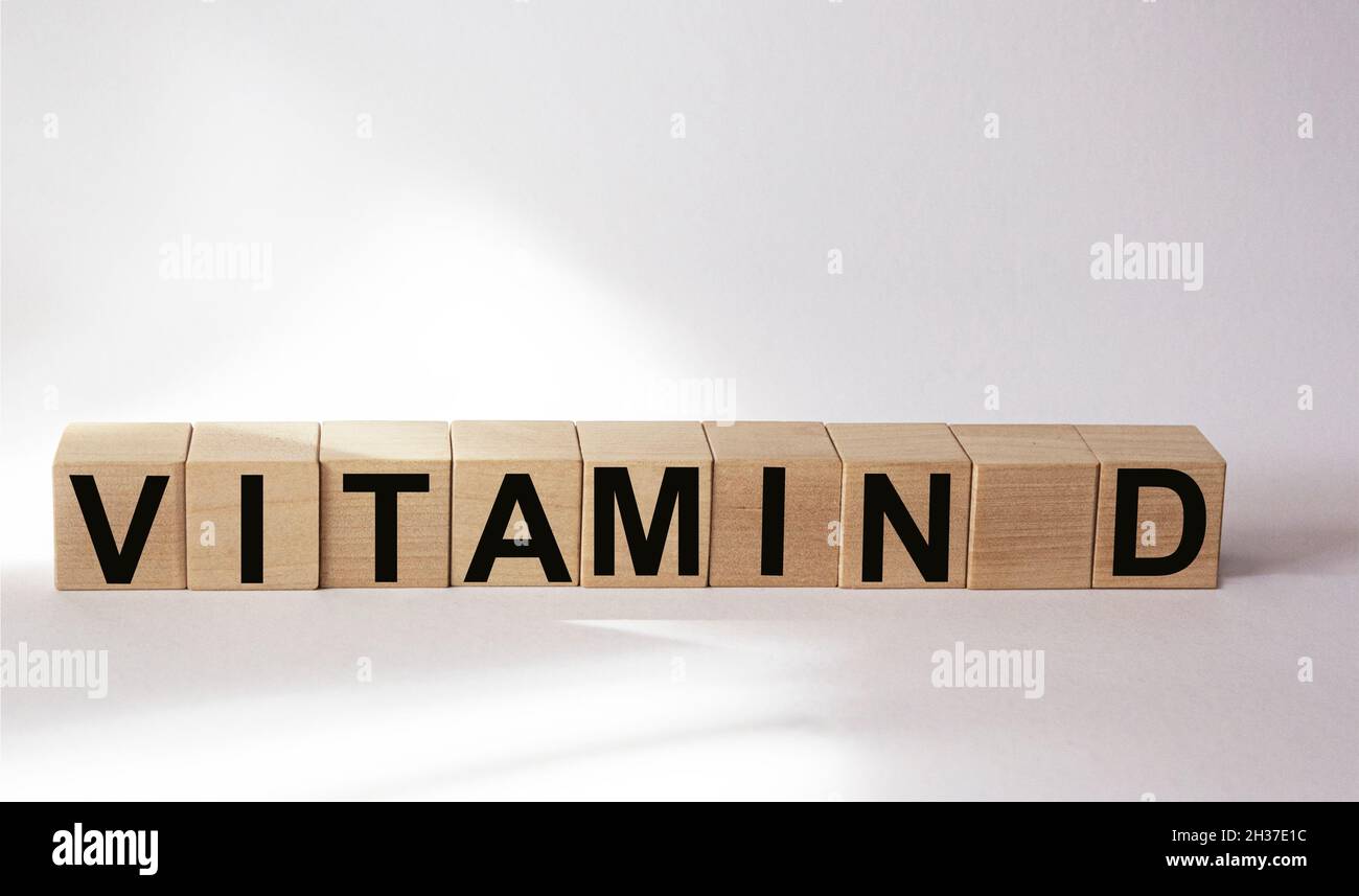 Wooden blocks with text Vitamin D on white background Stock Photo - Alamy