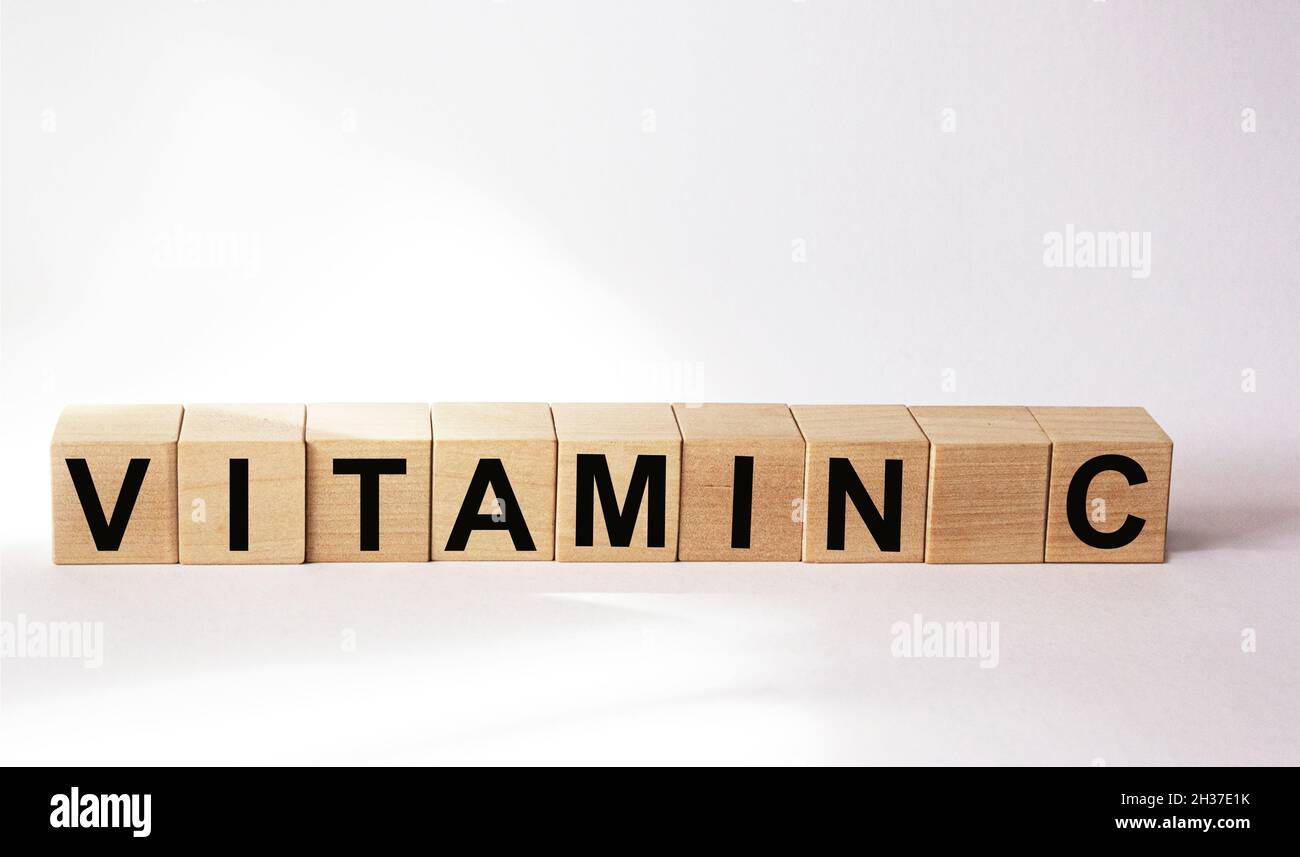 Wooden blocks with the text: Vitamin C on a white background Stock ...