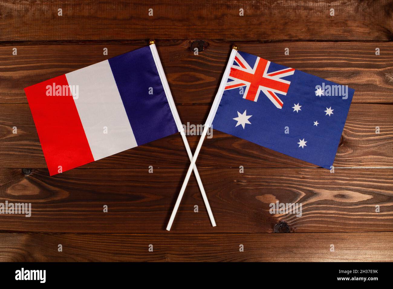 Flag of France and flag of Australia crossed with each other. France vs ...