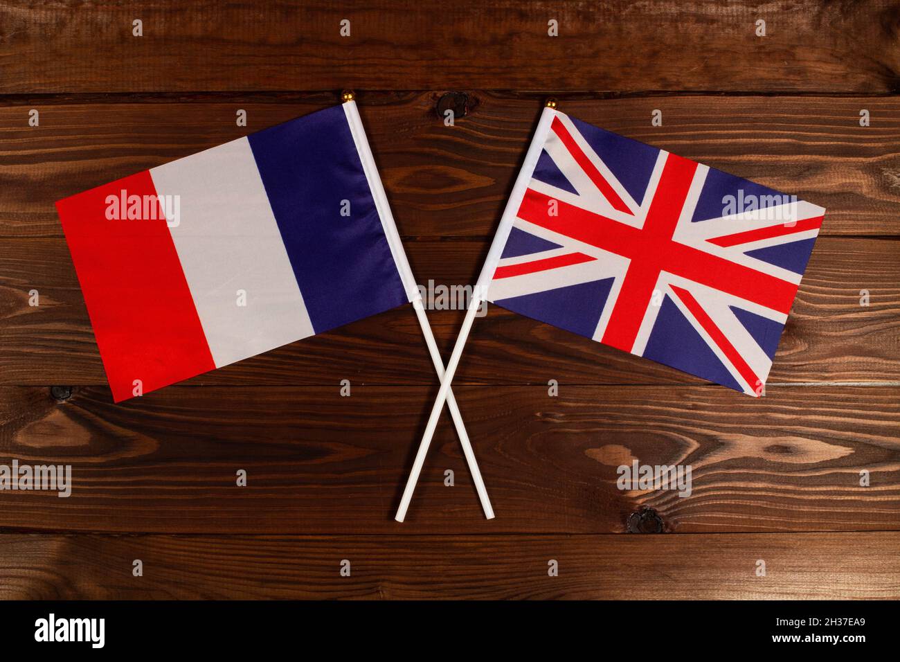 Flag of France and flag of Great Britain crossed with each other ...
