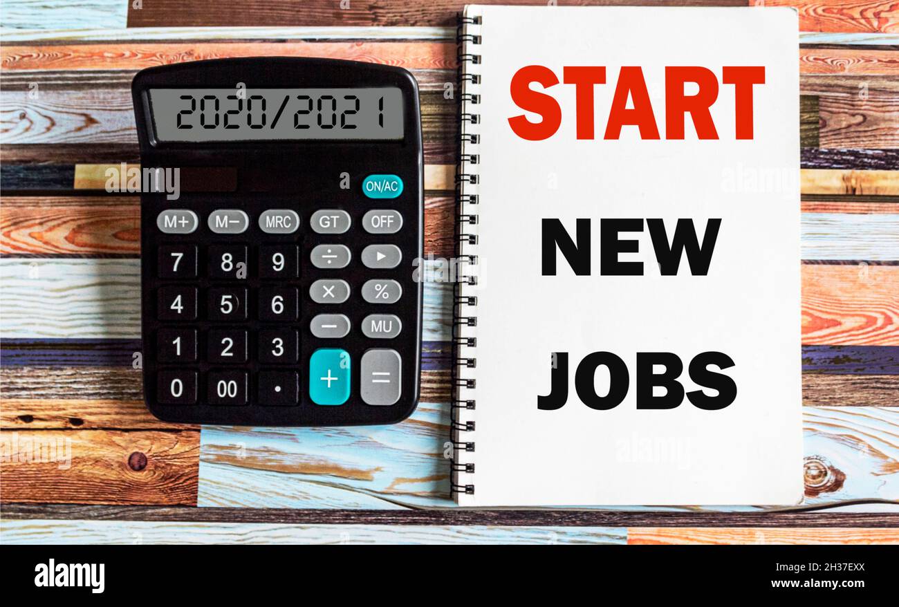 Start a new job, the text is written on a notebook, next to a ...