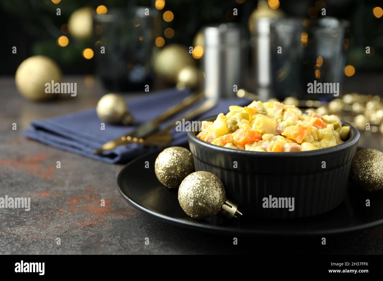 Christmas concept of tasty food with Olivier salad and bokeh Stock ...