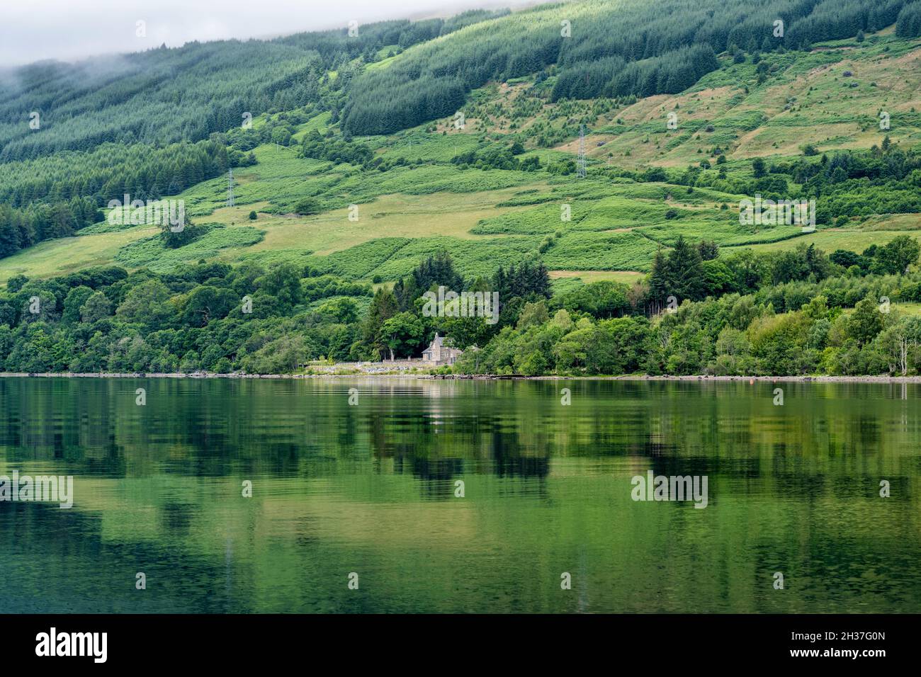 Colourful reflections on Loch Tay in Highland Perthshire, Scotland, UK ...