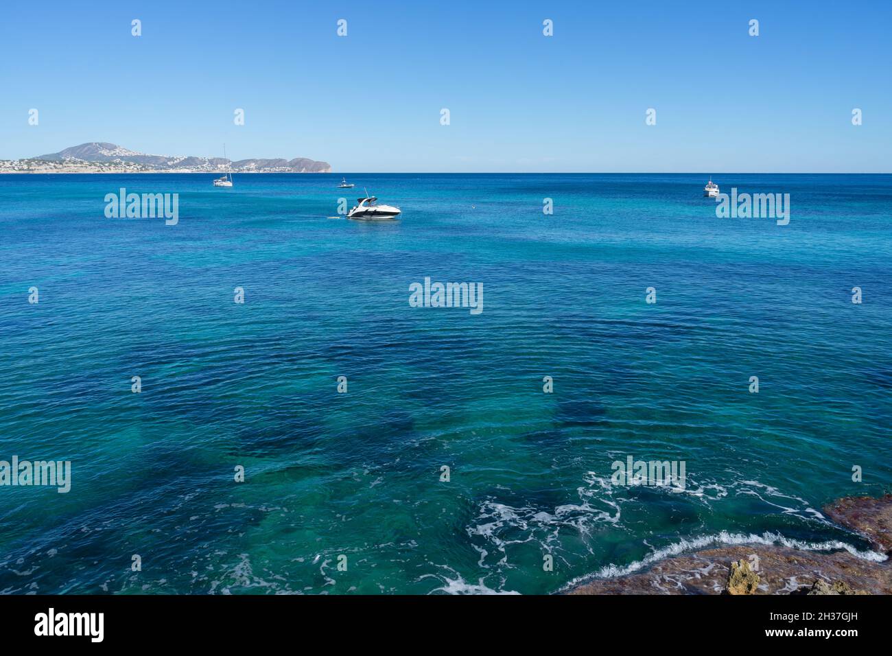 boats on the blue mediterranean sea on a sunny summer day beautiful ...