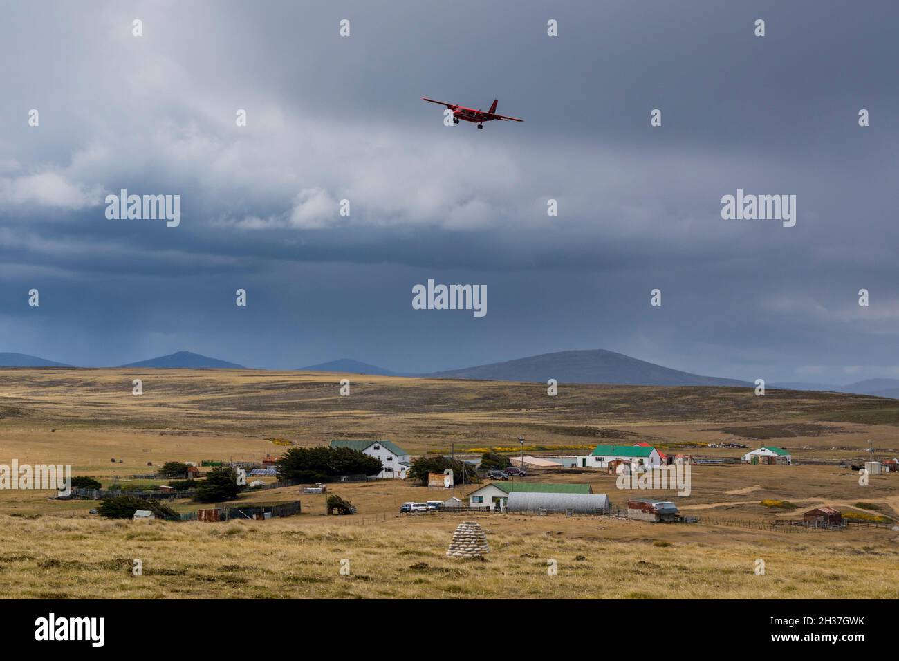 An airplane landing on Pebble Island airstrip. Pebble Island, Falkland ...