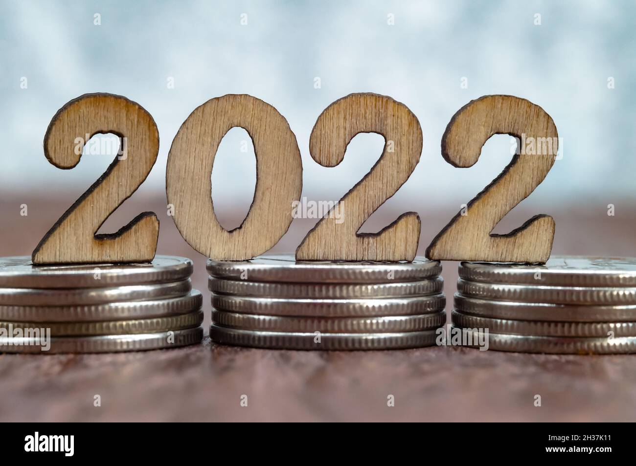 Coins and Figures 2022. Banner 2022. Money stacked in columns Stock ...