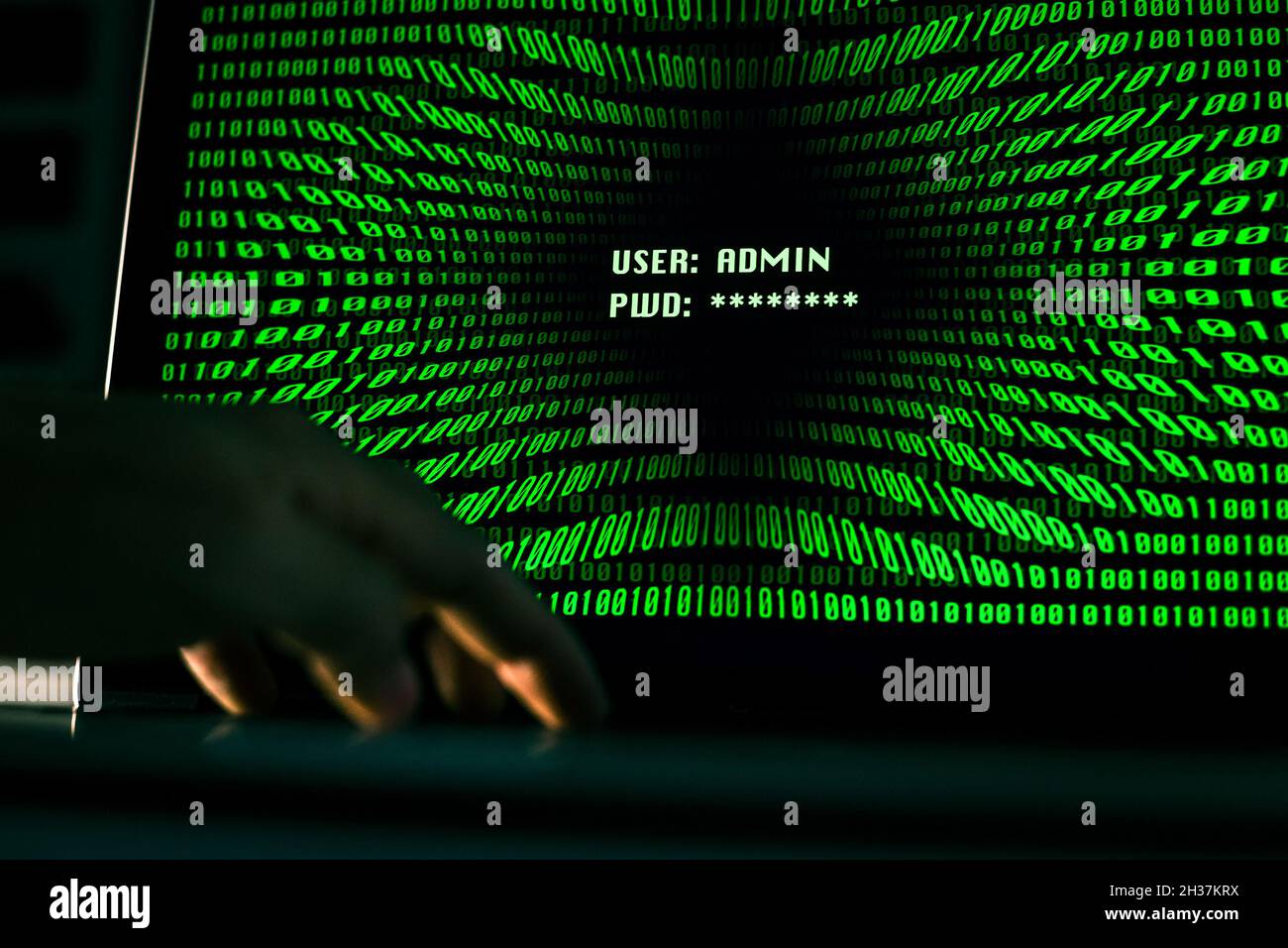 Hand typing on a laptop keyboard green numbers on display. Successful login with credentials ...