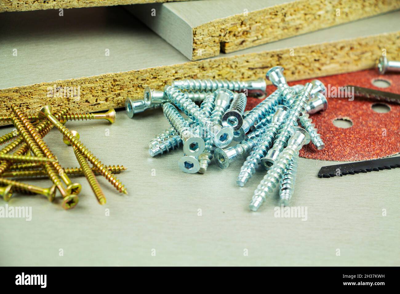 tools for repair and construction. Screwdriver, furniture screws ...