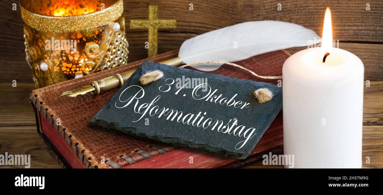 German Reformation Day October 31 and bible with cross and white ...