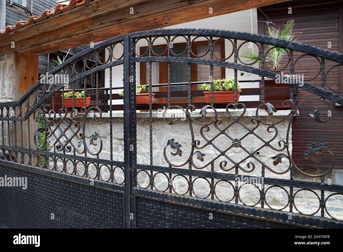beautiful metal forged gate close up Stock Photo - Alamy