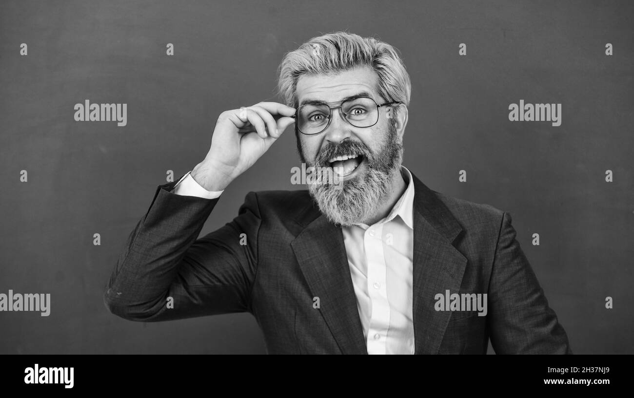 Study less, study smart. Happy teacher with smart look in glasses ...