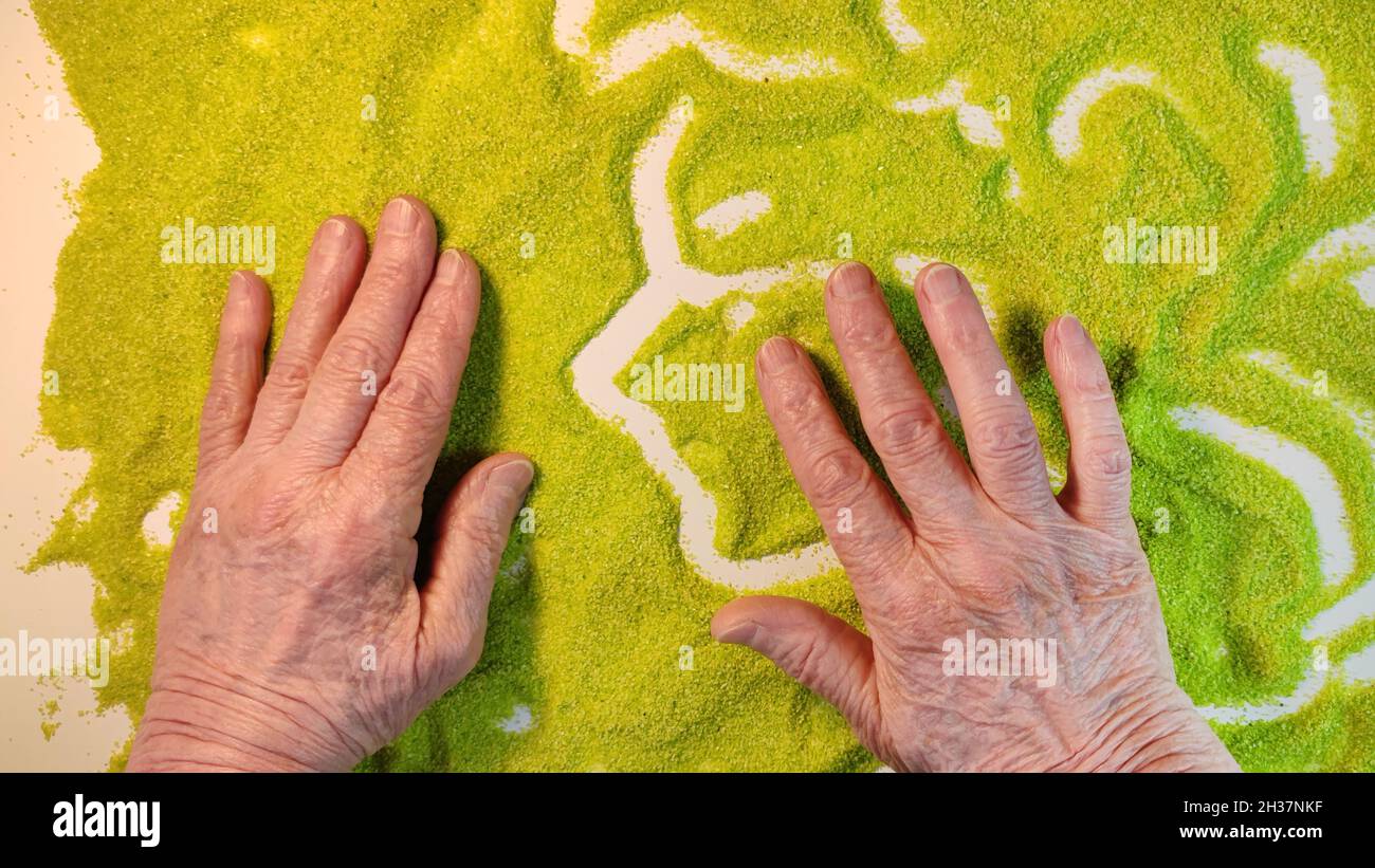 Elderly hands drawing hi-res stock photography and images - Alamy