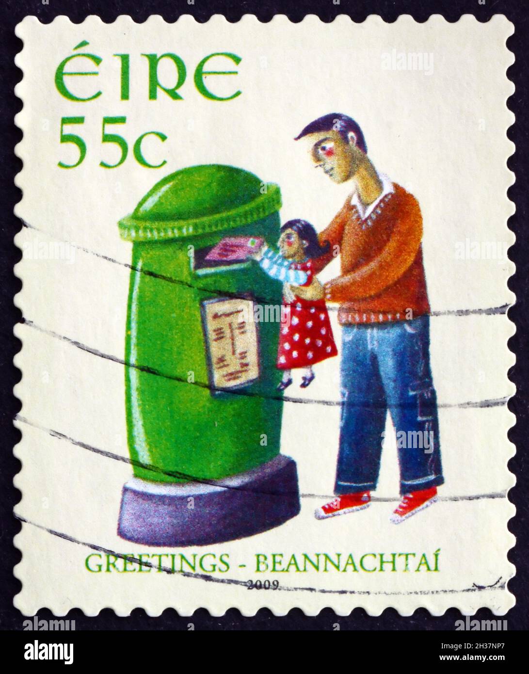 IRELAND - CIRCA 2009: a stamp printed in Ireland shows Man and Girl ...
