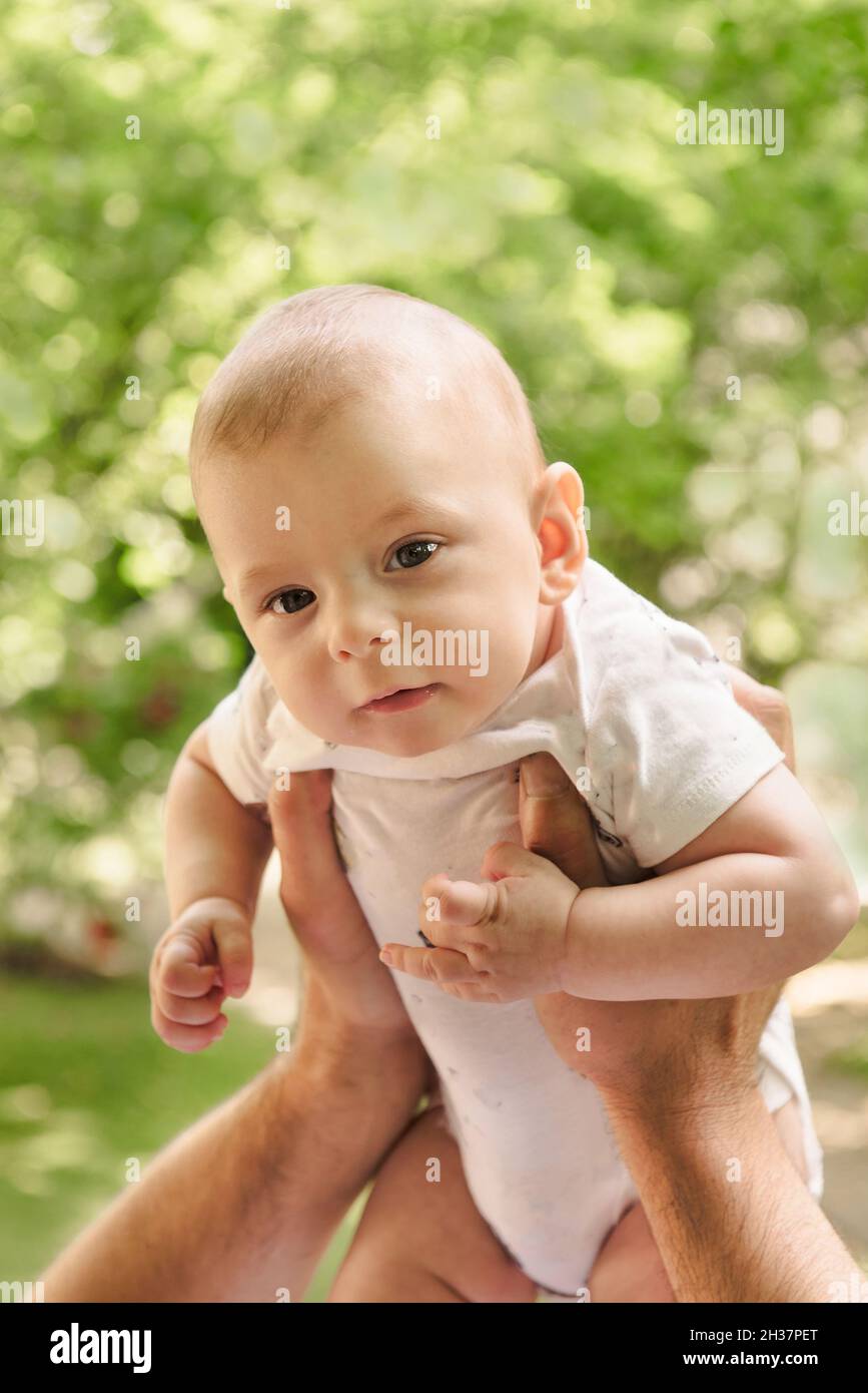 Baby in fathers hand hi-res stock photography and images - Alamy