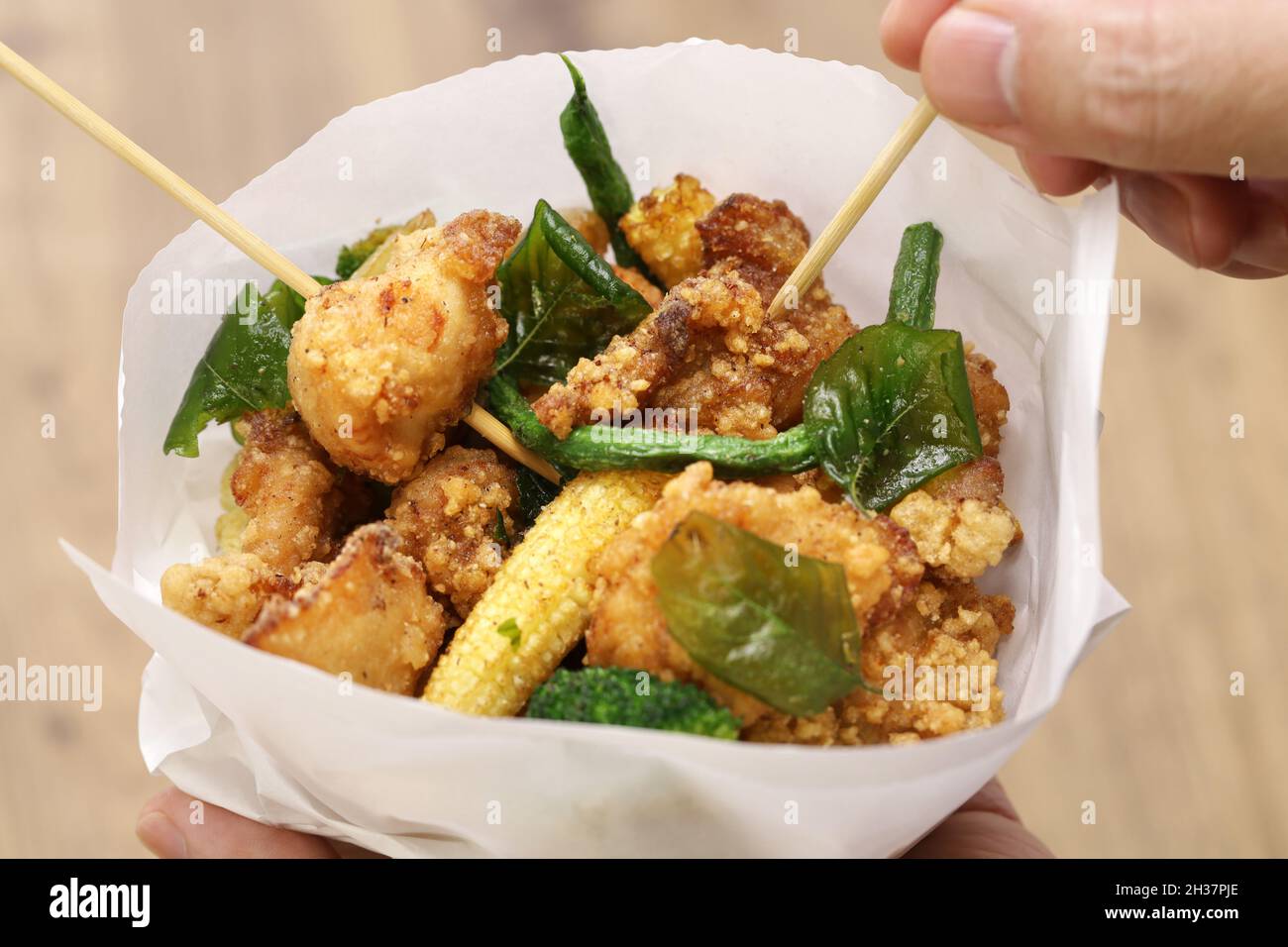 Taiwanese popcorn chicken with fried basil, and you can usually choose ...