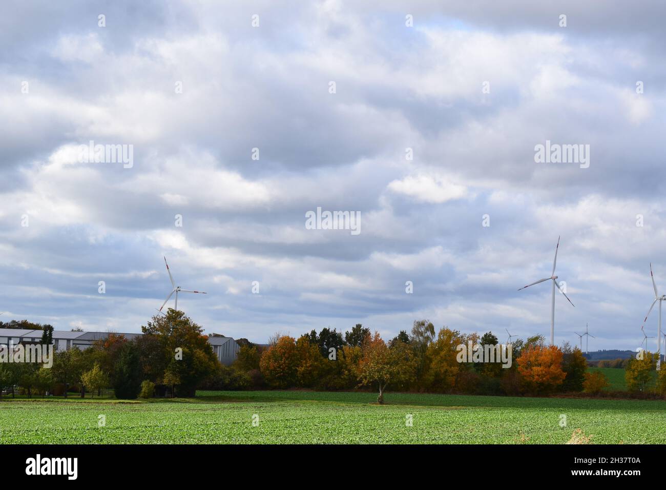 Eifel village Kehrig with wind power plants Stock Photo - Alamy