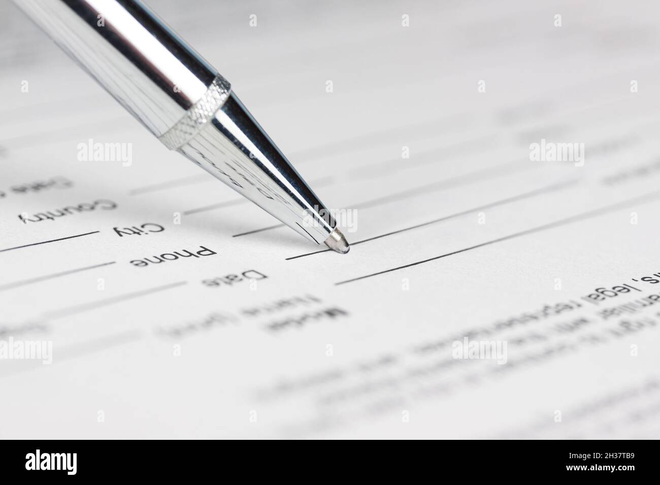 Signing form hi-res stock photography and images - Alamy