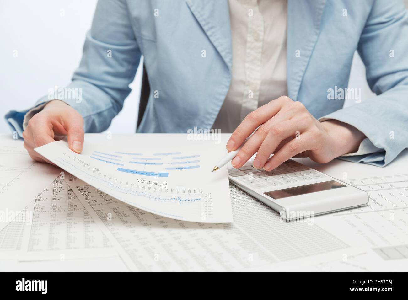 Financial accounting business woman using calculator in office Stock ...