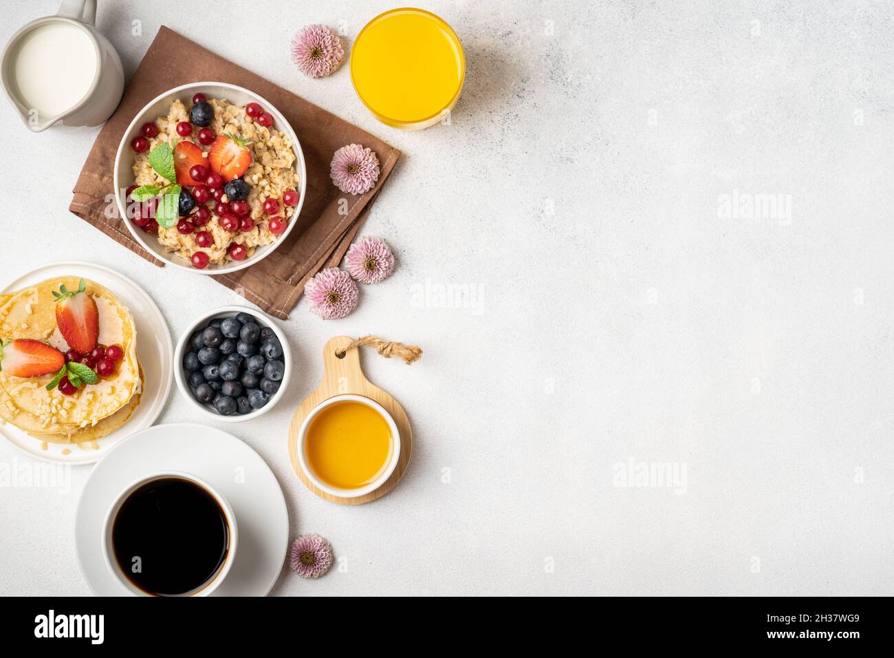 Morning served breakfast set: pancakes, porridge, cottage cheese ...