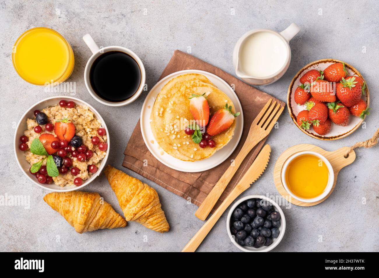 Morning served breakfast set: pancakes, porridge, cottage cheese ...