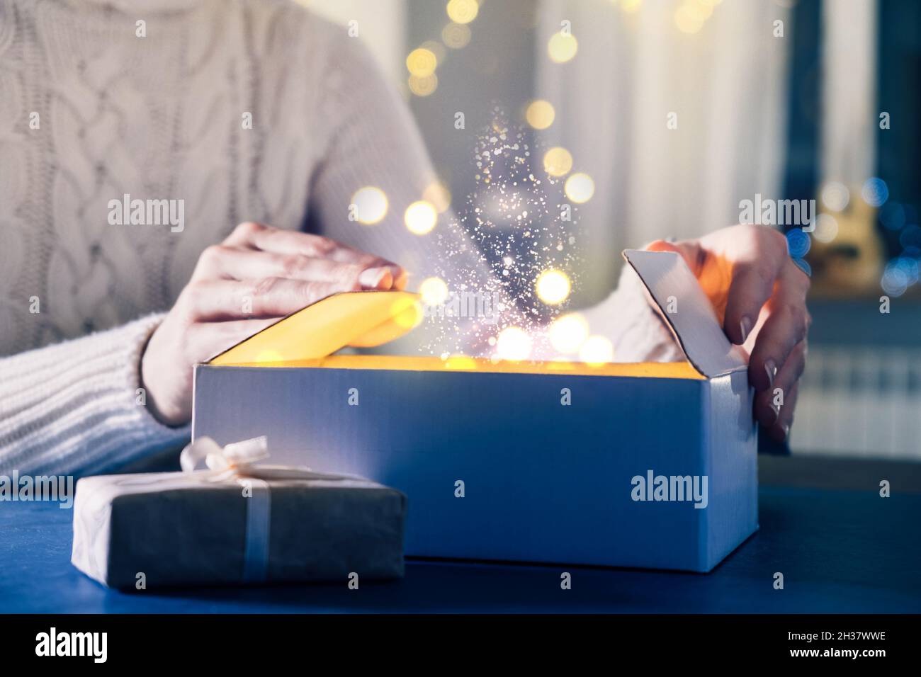 Person opens gift, miracles and wishes come true on Christmas eve ...