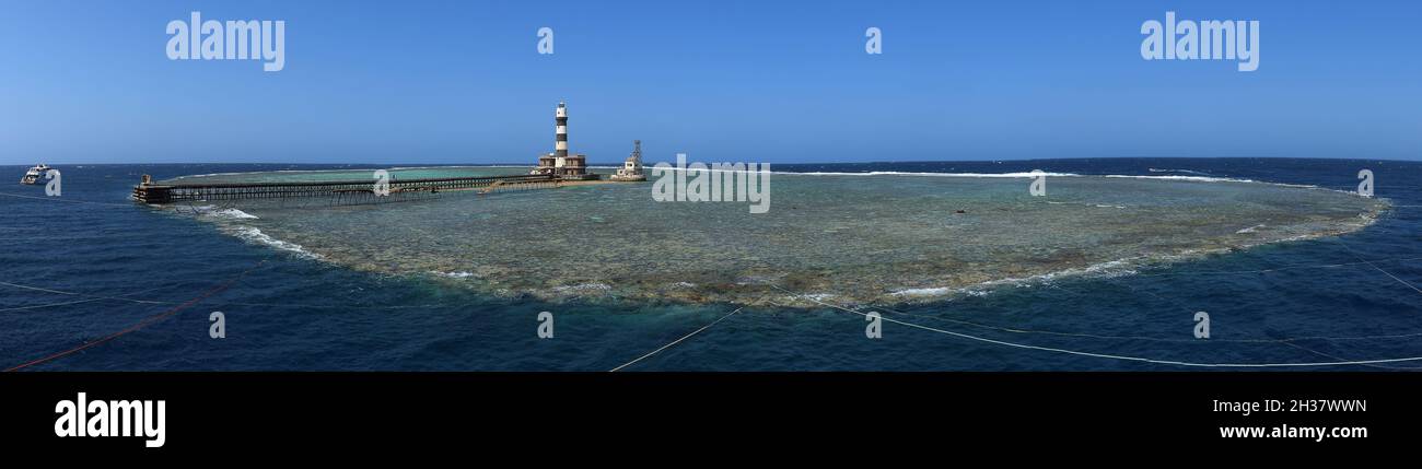 Daedalus Reef and lighthouse in the middle of the Red Sea Stock Photo ...