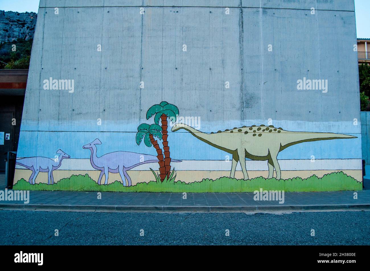 Dinosaurs pictures in a museum wall Stock Photo - Alamy