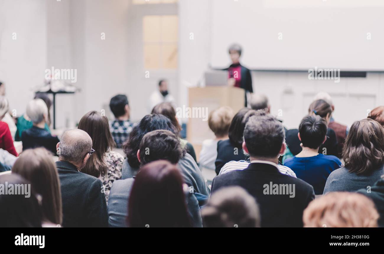 Woman giving presentation on business conference event Stock Photo - Alamy