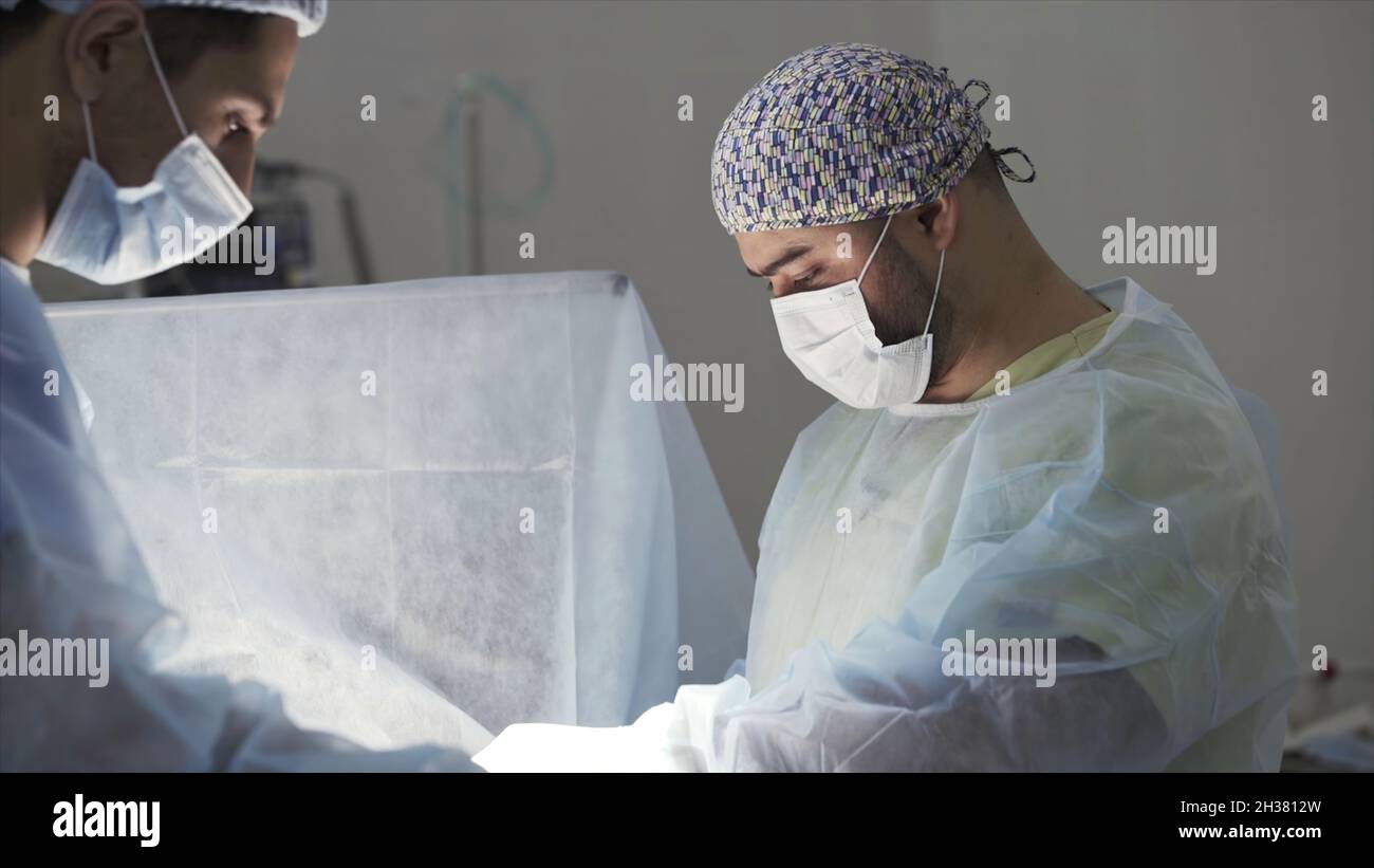Details of a real surgery in the sterile operating theatre. Action ...