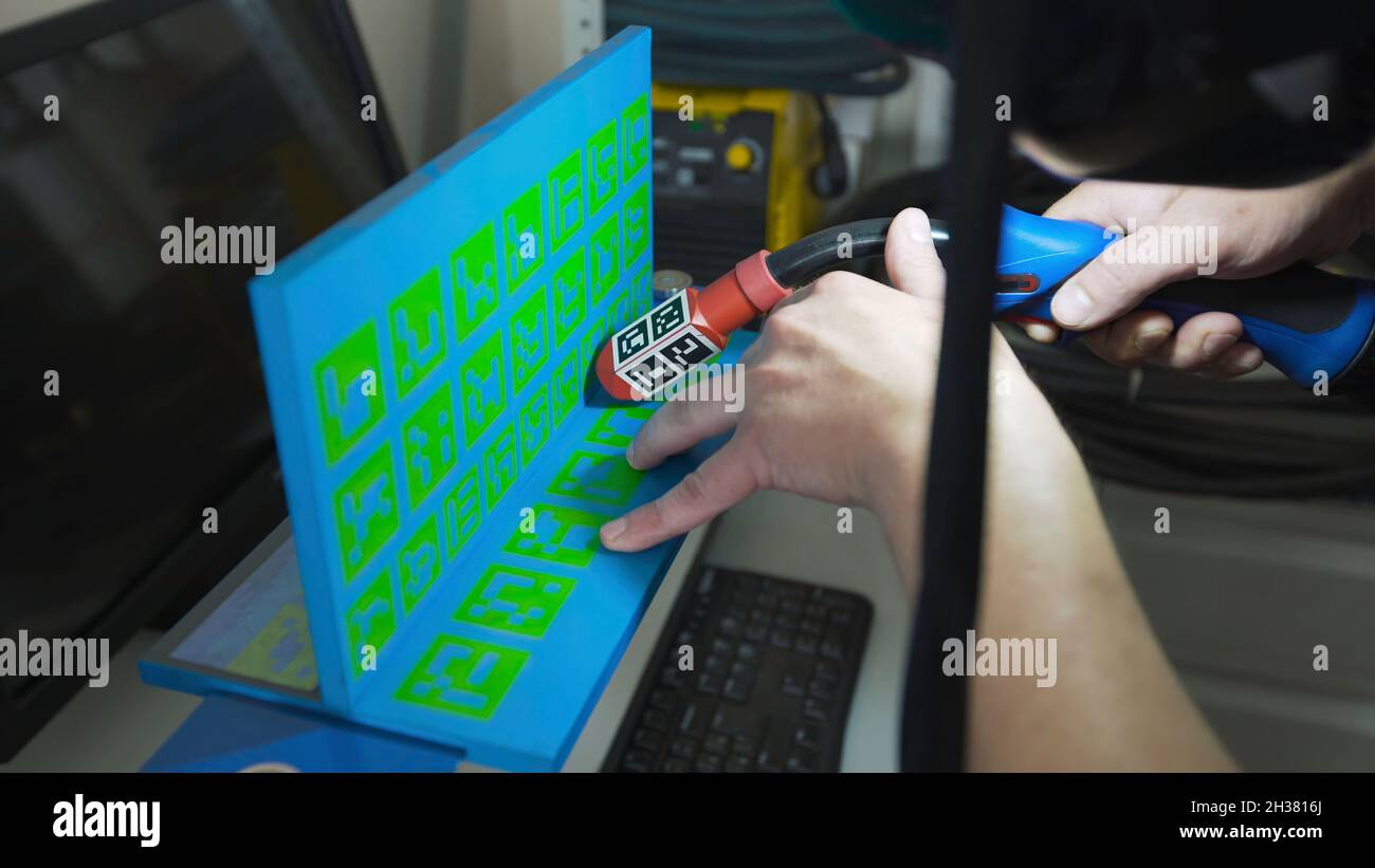 Working on welding simulator. Scene. Man tries himself in welding on ...