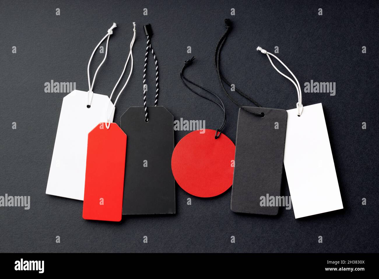 Six different price tags on black background Stock Photo - Alamy
