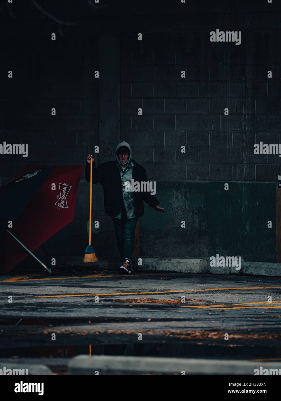 Lady with broom hi-res stock photography and images - Alamy