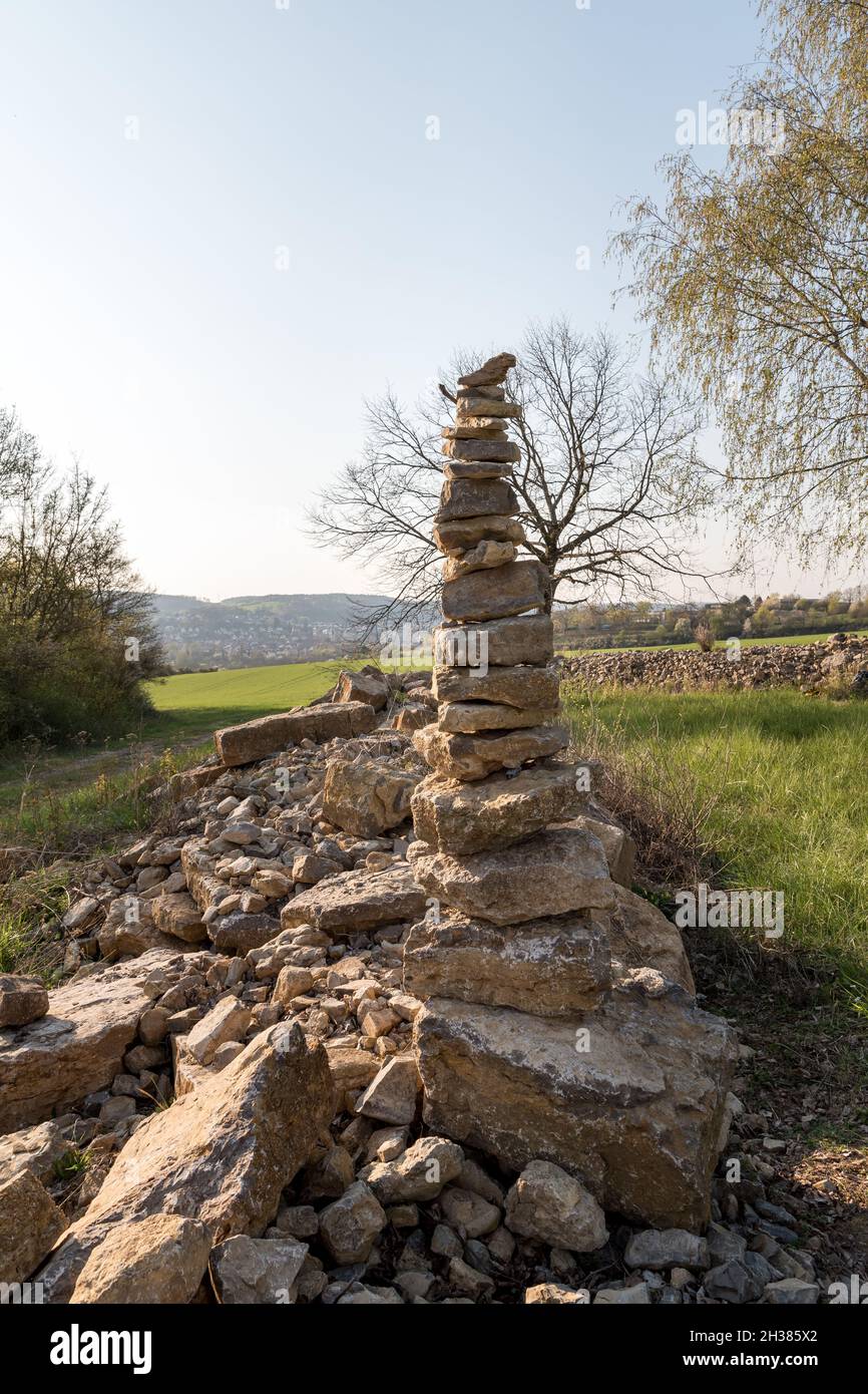 Natural stones stacked to form a tower in the near from the German city ...