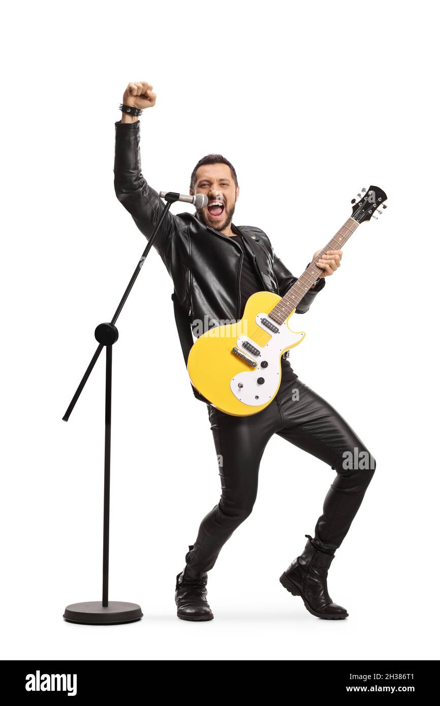 Cool male guitarist singing and raising hand isolated on white ...