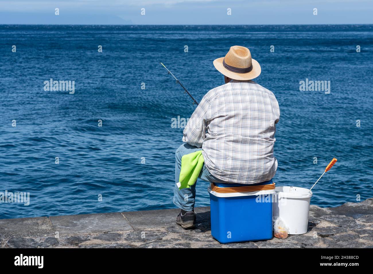 Fisherman sits catches fish hi-res stock photography and images - Alamy